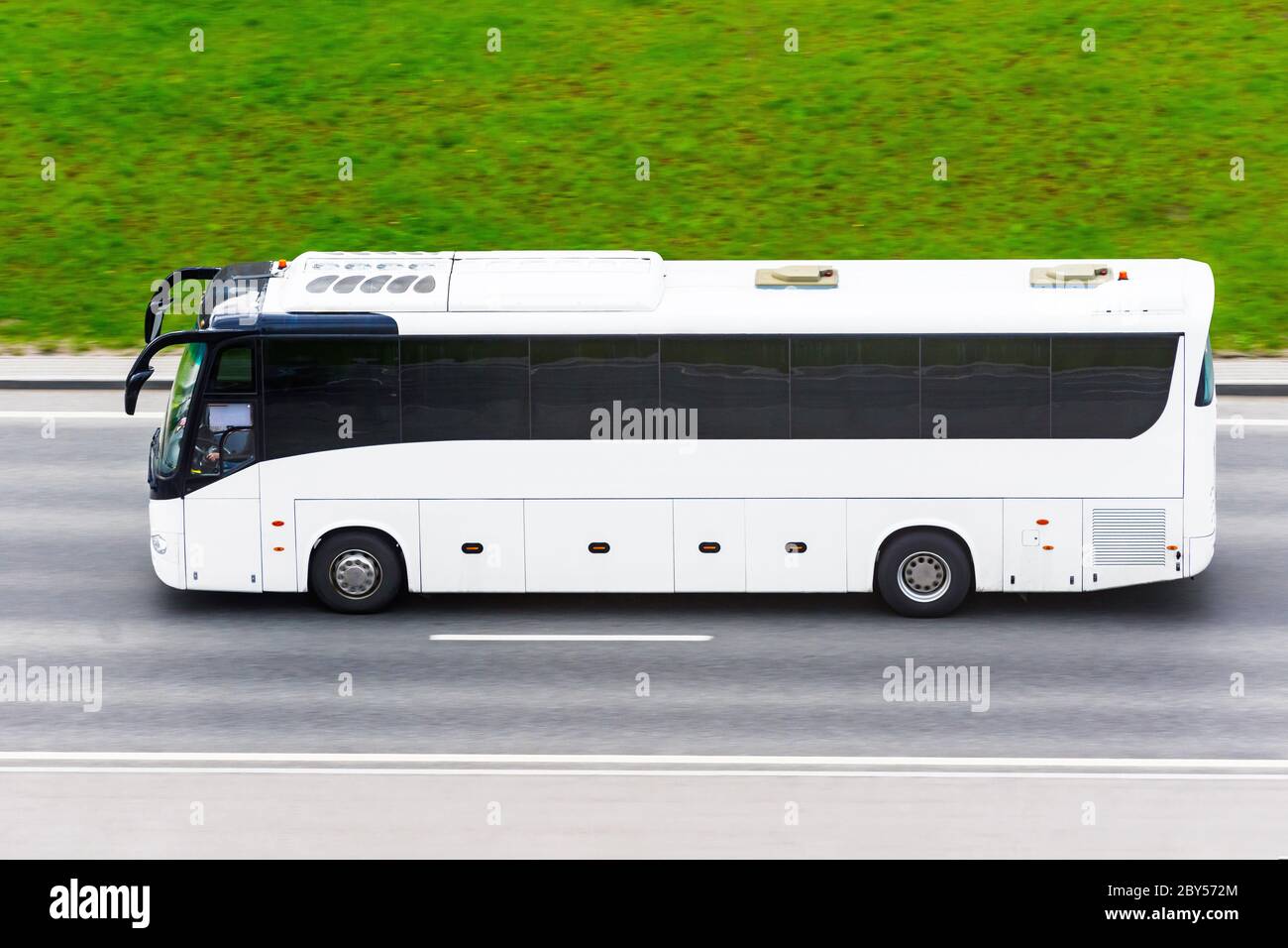 Bus rides on the highway side aerial view Stock Photo - Alamy