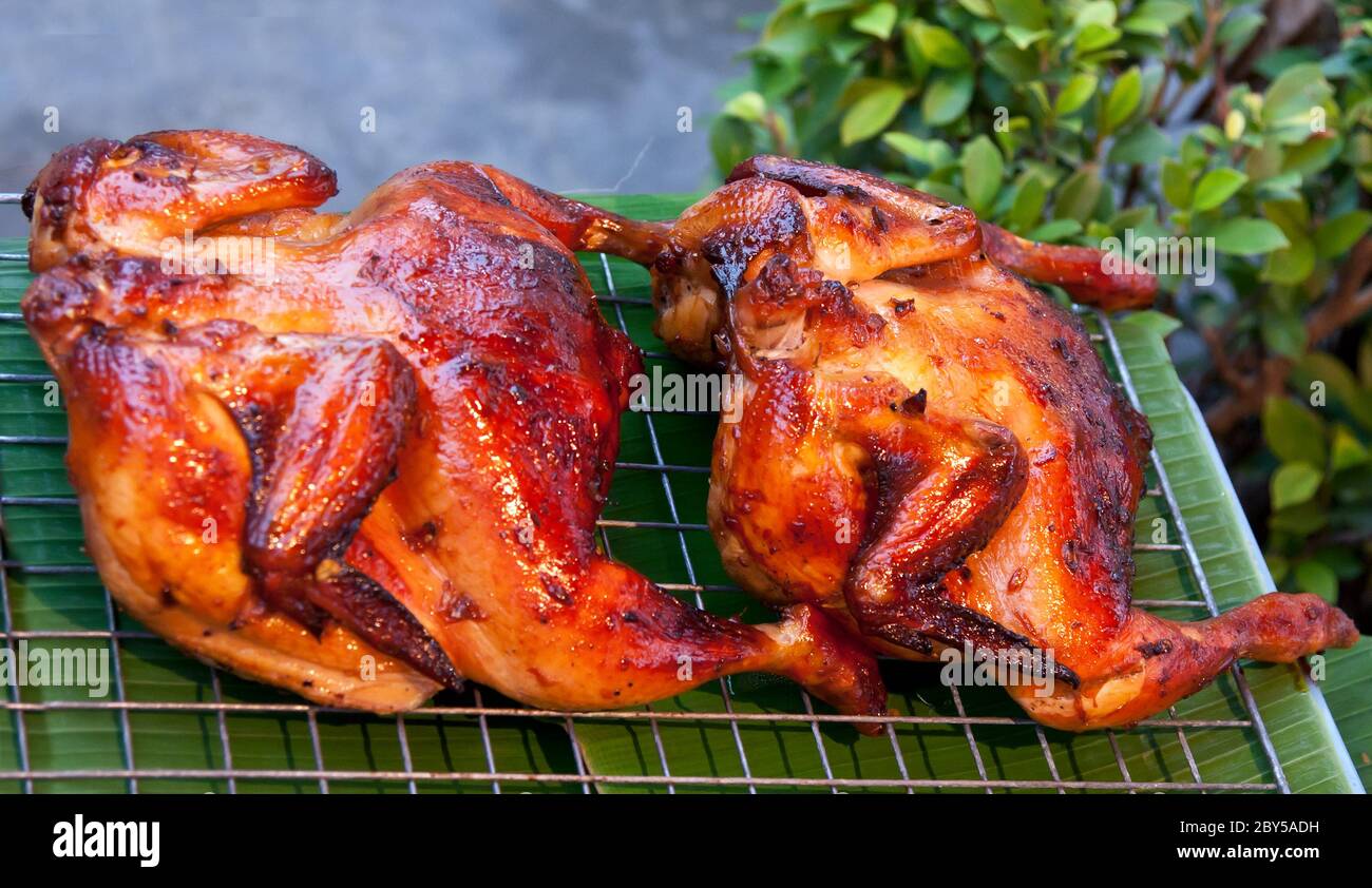two delicious grilled chicken Stock Photo - Alamy