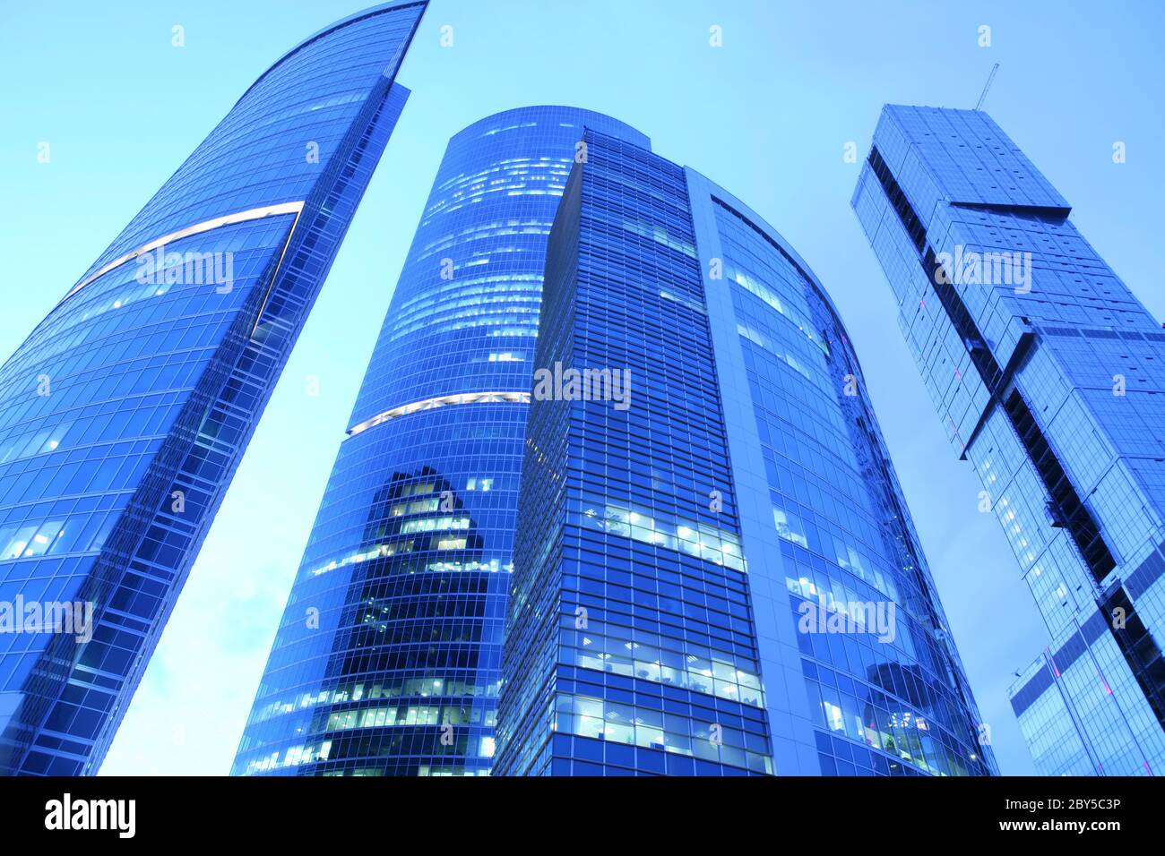 four blue skyscrapers Stock Photo - Alamy