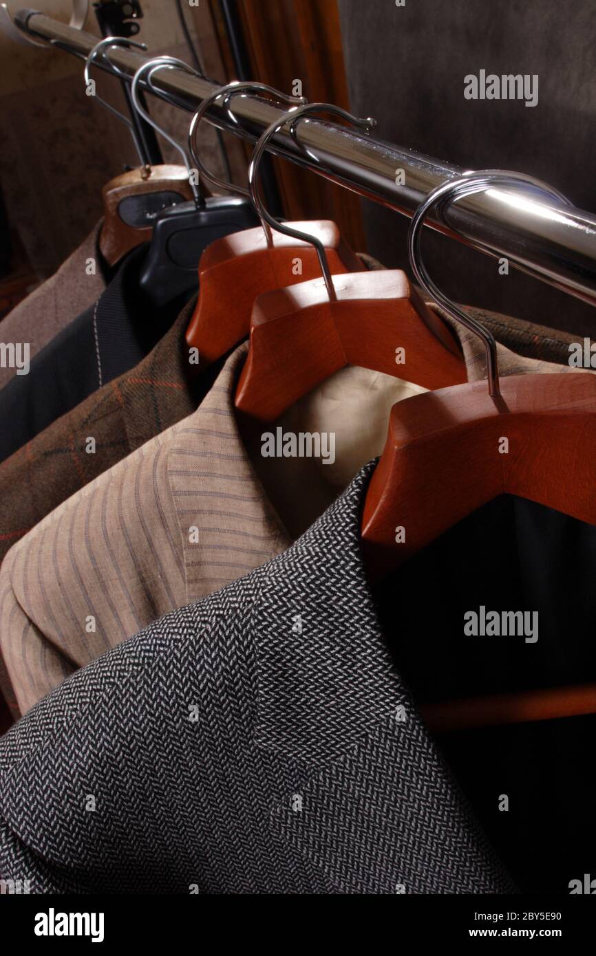 Jackets on Clothes hanger Stock Photo - Alamy