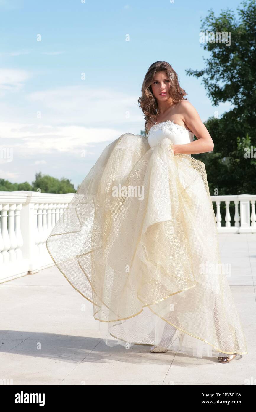 beautiful princess in golden gown Stock Photo - Alamy