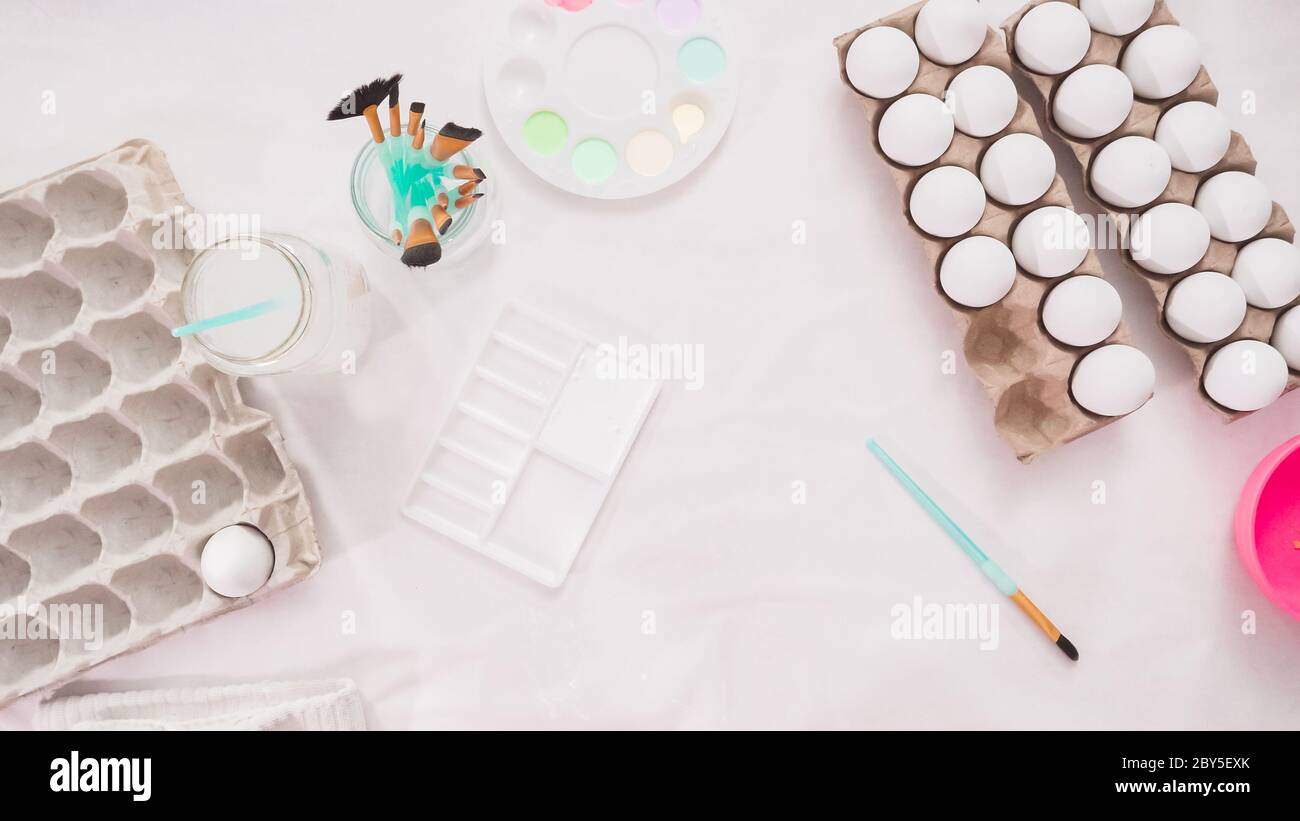 Flat lay. Painting craft Easter eggs with acrilic paint Stock Photo - Alamy