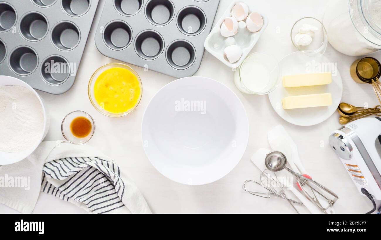 Flat lay. Step by step. Mixing batter to bake vanilla cupcakes with ...