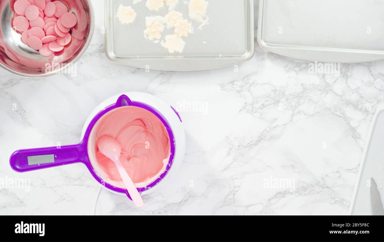 Flat lay. Step by step. Melting chocolate candy melts in an electric ...