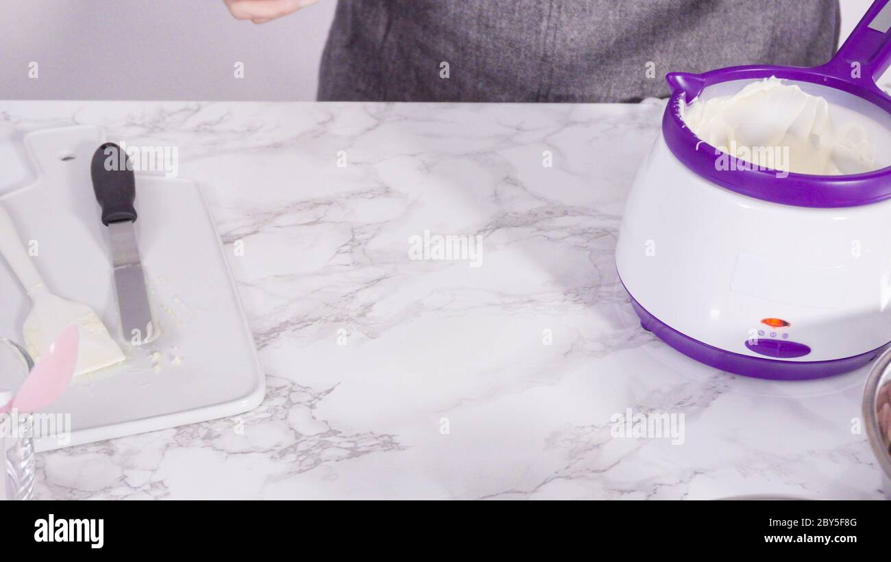 Step by step. Melting chocolate candy melts in an electric candy ...