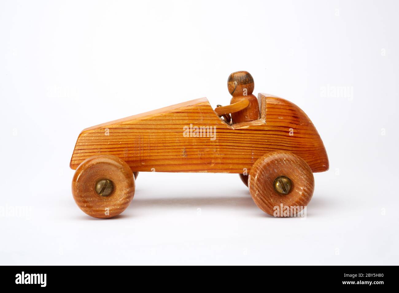 Photograph of a handmade wooden toy car with driver Stock Photo - Alamy