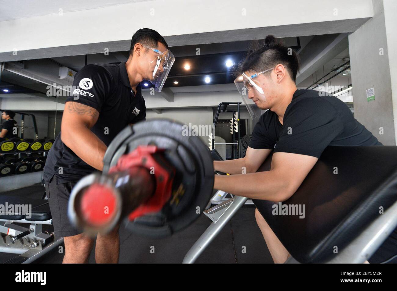 Bangkok, Thailand. 9th June, 2020. People wearing face shields exercise ...