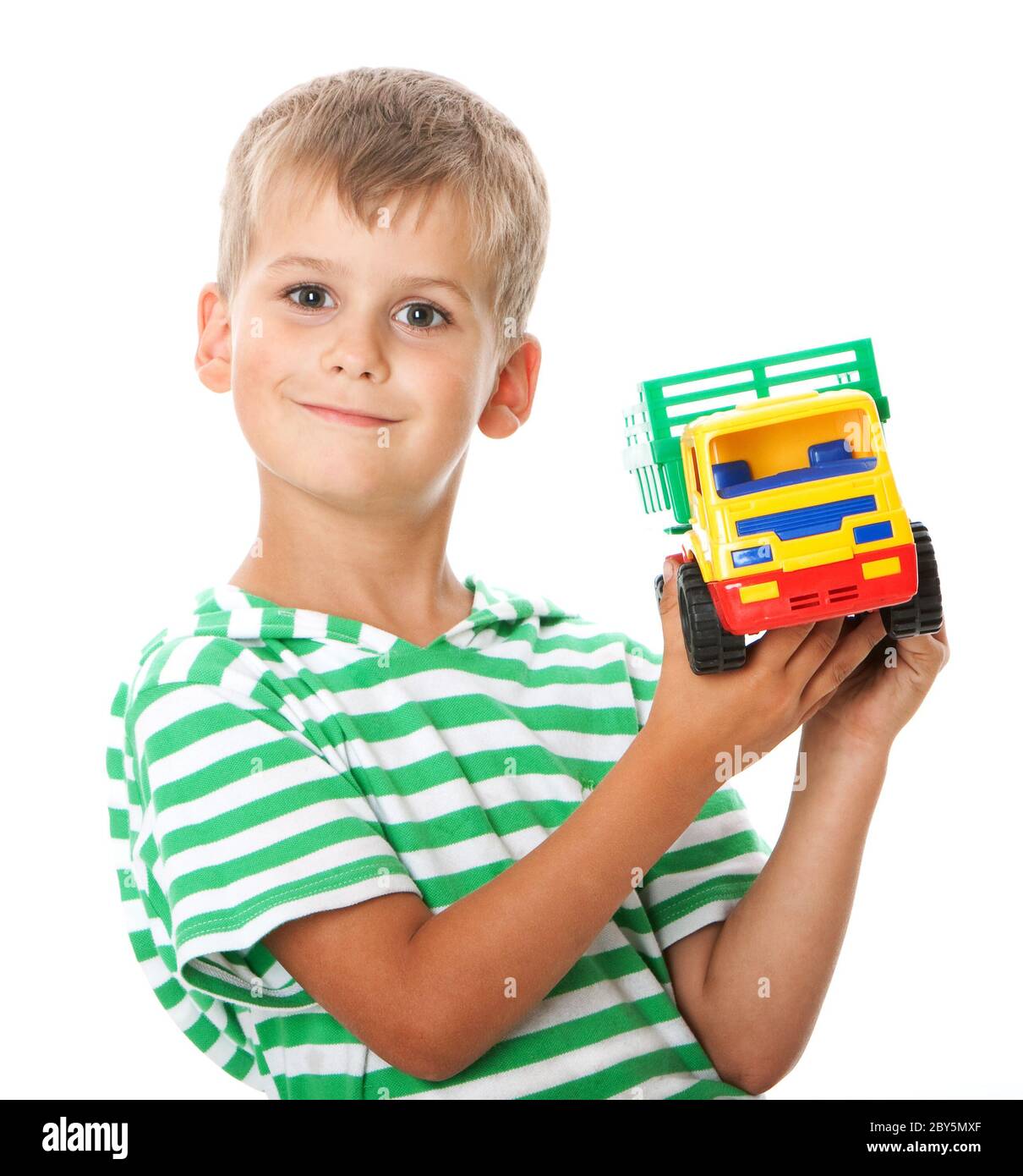 Boy holding car isolated on white background Stock Photo - Alamy