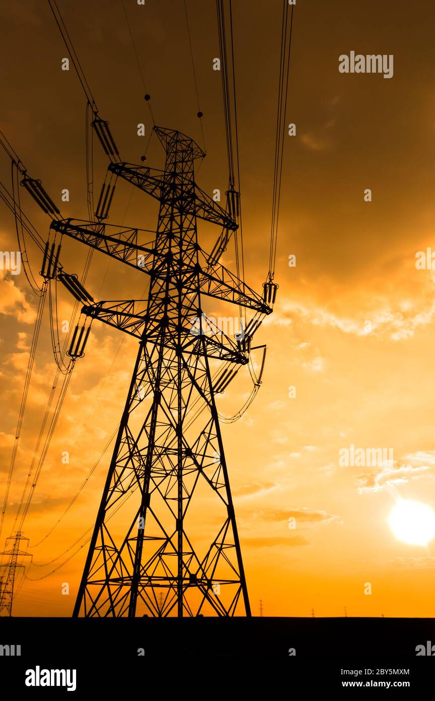 Power lines at sunset hi-res stock photography and images - Alamy