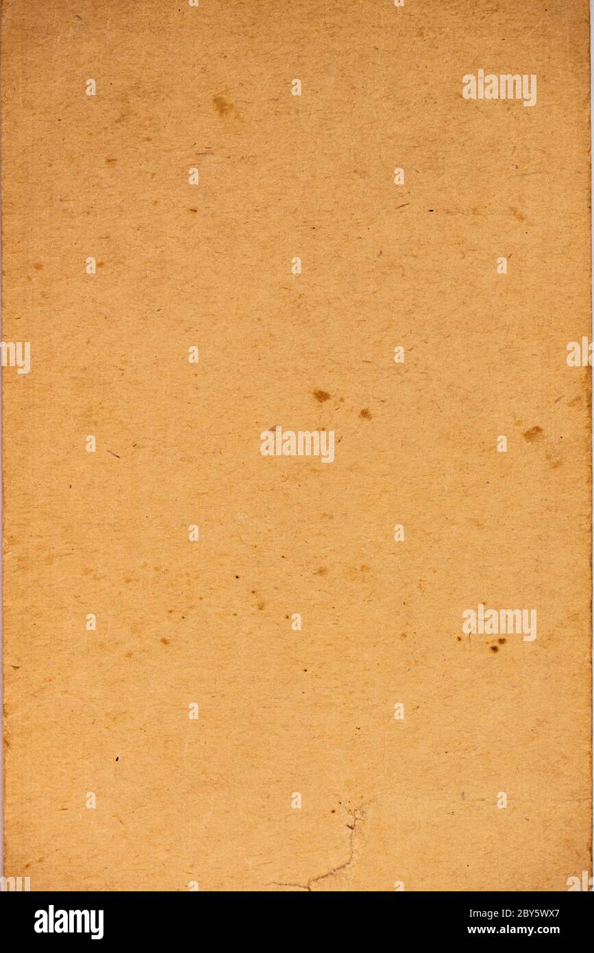 Old yellow craft paper background Stock Photo - Alamy