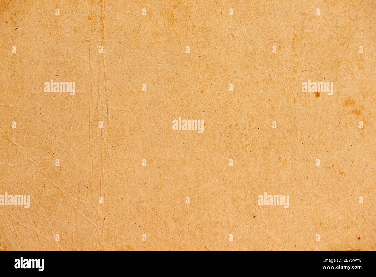 Old yellow craft paper background Stock Photo - Alamy