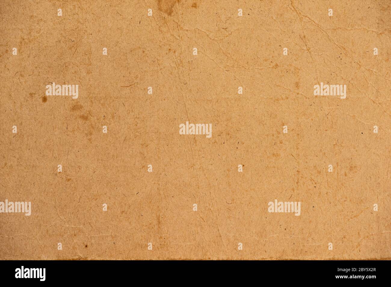 Old yellow craft paper background Stock Photo - Alamy