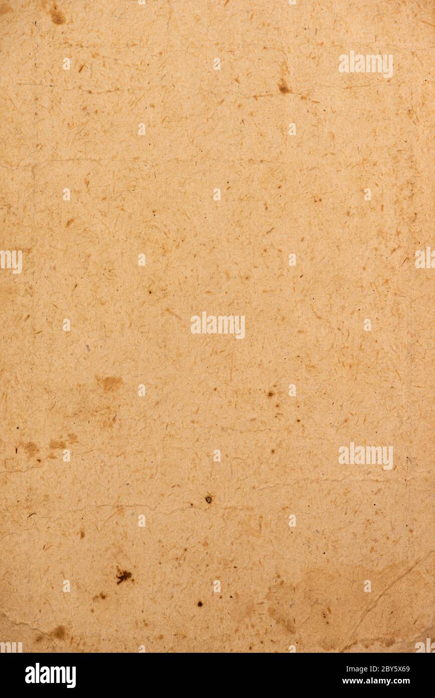 Old yellow craft paper background Stock Photo - Alamy