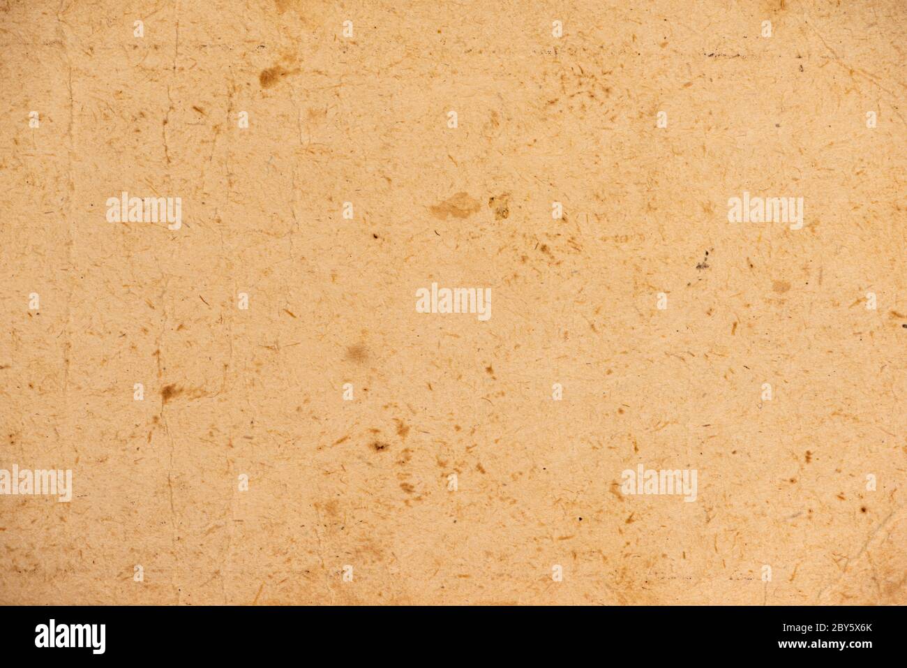 Old yellow craft paper background Stock Photo - Alamy