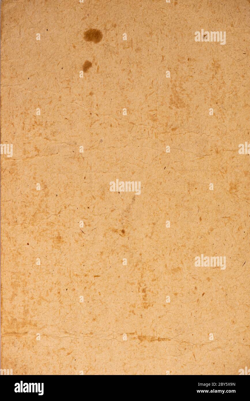 Old yellow craft paper background Stock Photo - Alamy