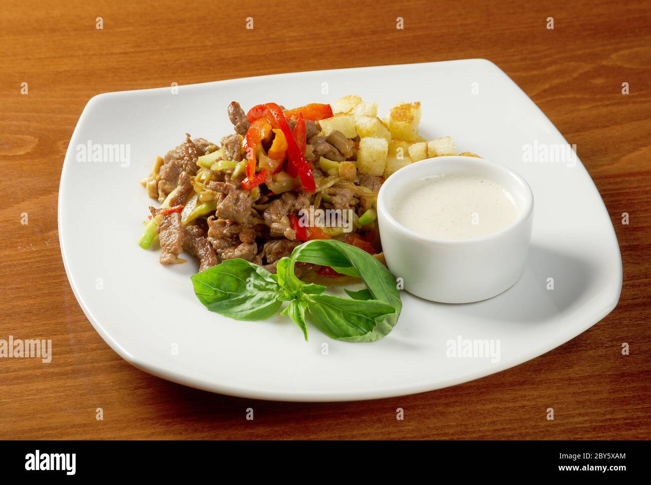 salad with meat ,cracker and basil Stock Photo - Alamy