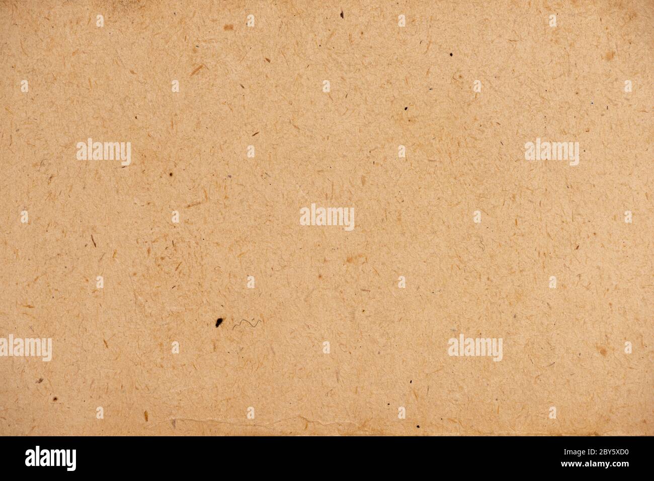 Old yellow craft paper background Stock Photo - Alamy