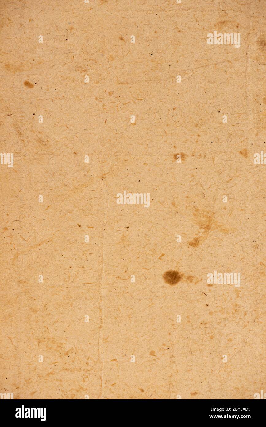 Old yellow craft paper background Stock Photo - Alamy