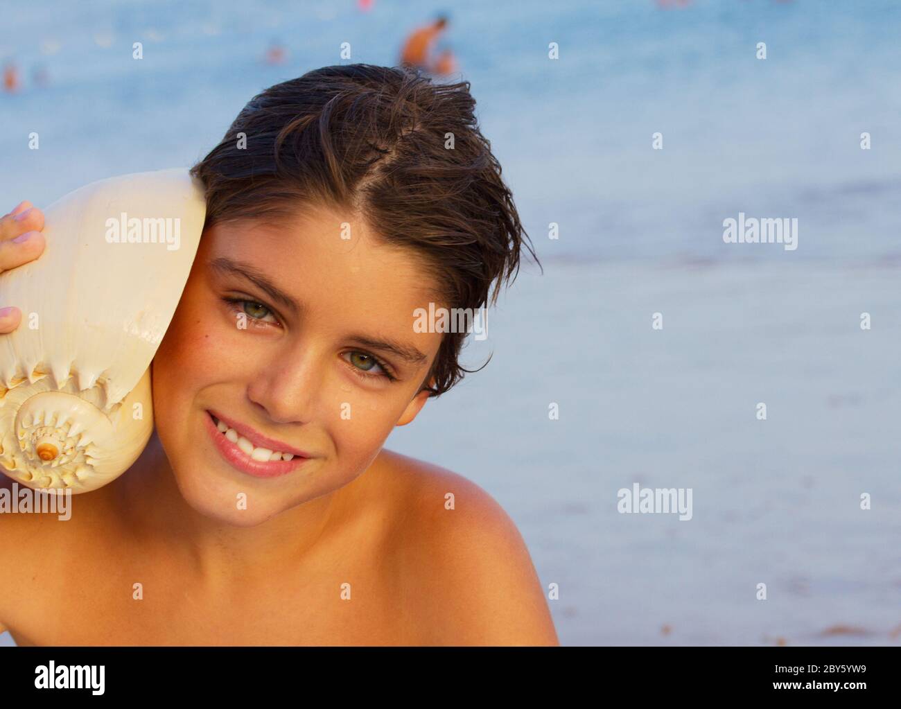 Boy Listen Shell High Resolution Stock Photography and Images - Alamy
