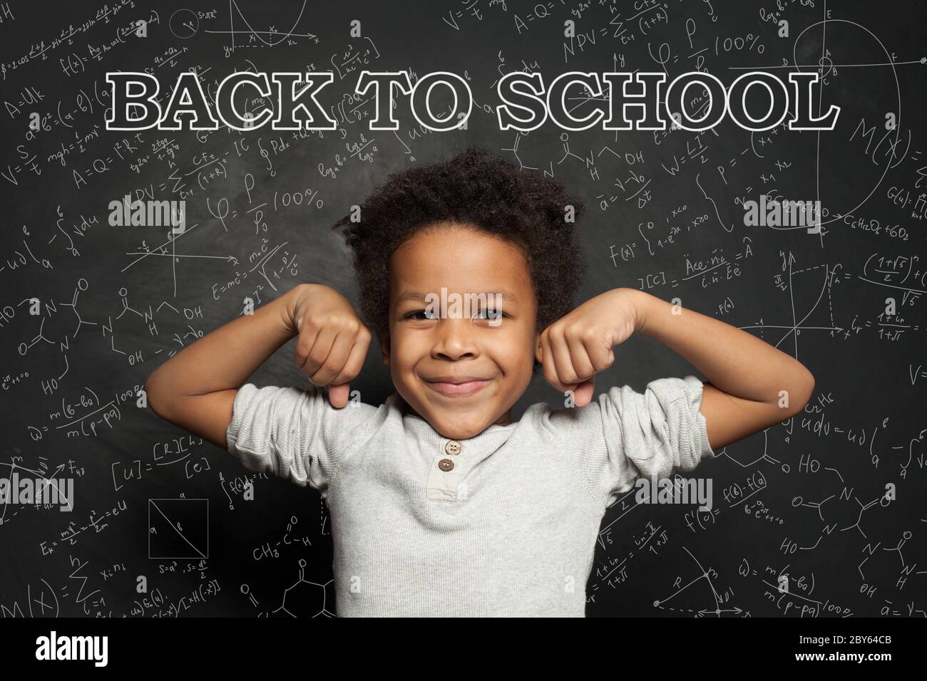 Strong smart happy black child boy student portrait. Back to school ...