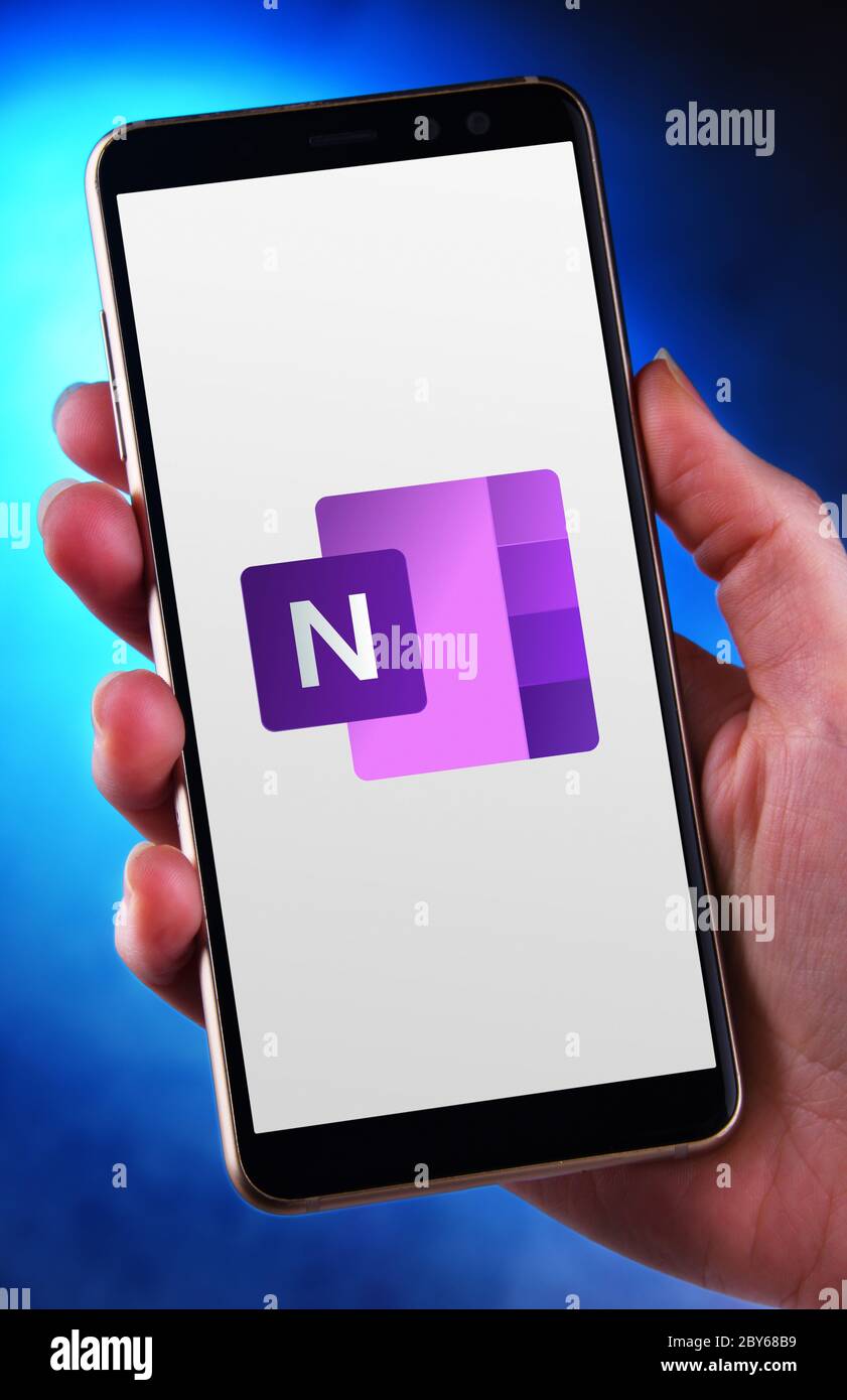 POZNAN, POL - MAY 21, 2020: Hand holding smartphone displaying logo of ...