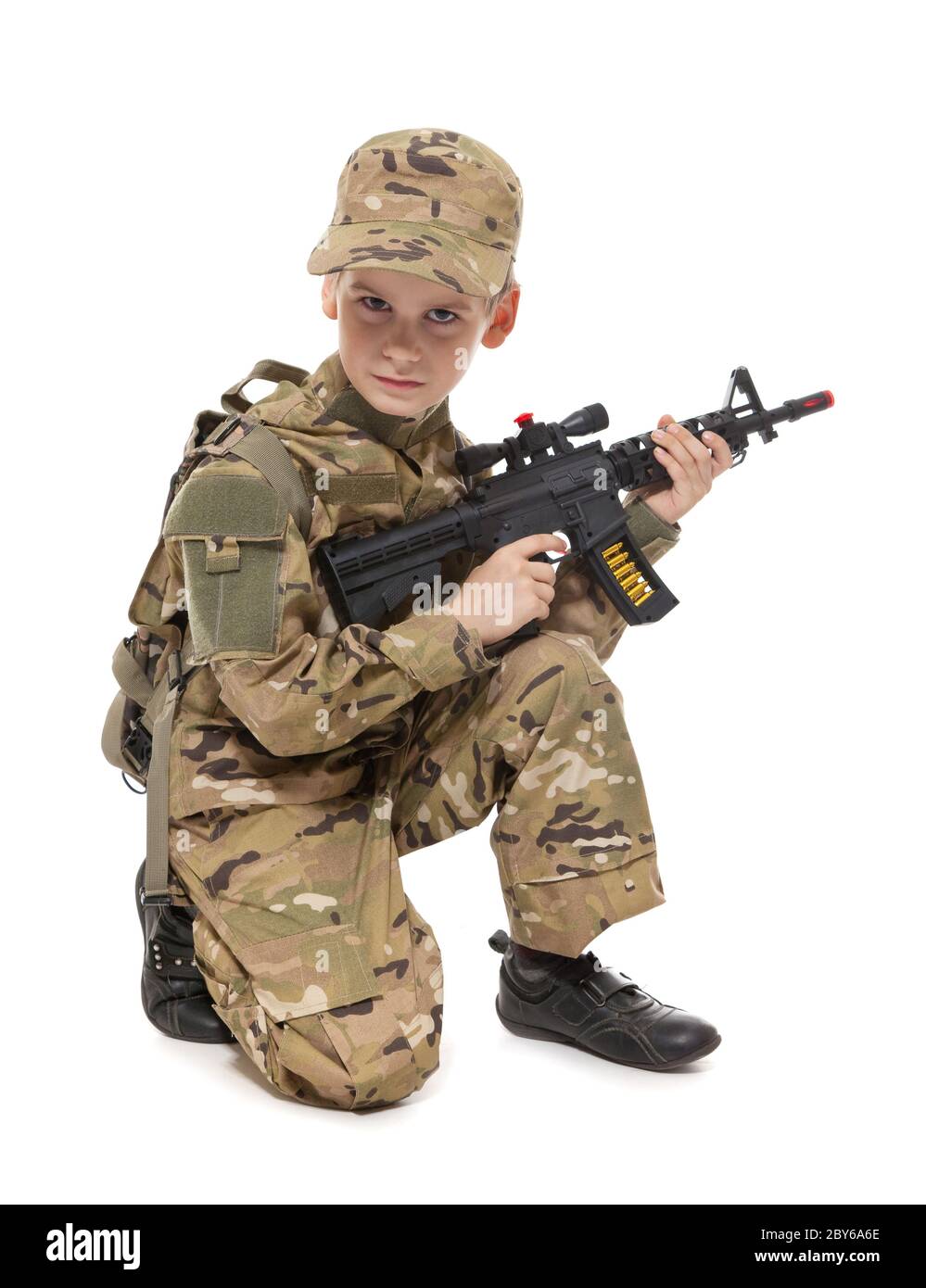 Young soldier with rifle Stock Photo - Alamy