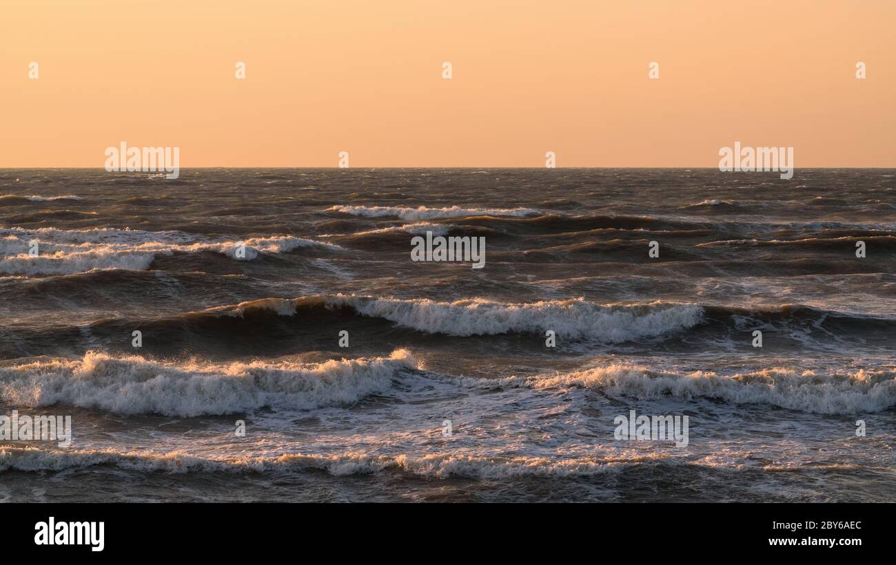 Stormy sea at sunset hi-res stock photography and images - Alamy