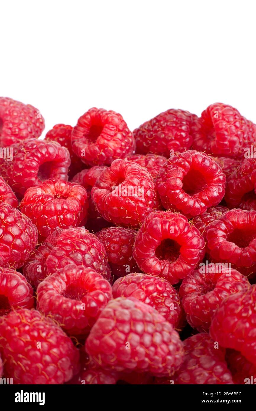 Ripe raspberries fruit background. Іsolated on white Stock Photo - Alamy