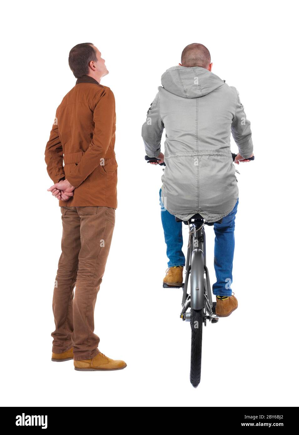 Back view of two man on a bicycle in winter jacket. Rear view people ...