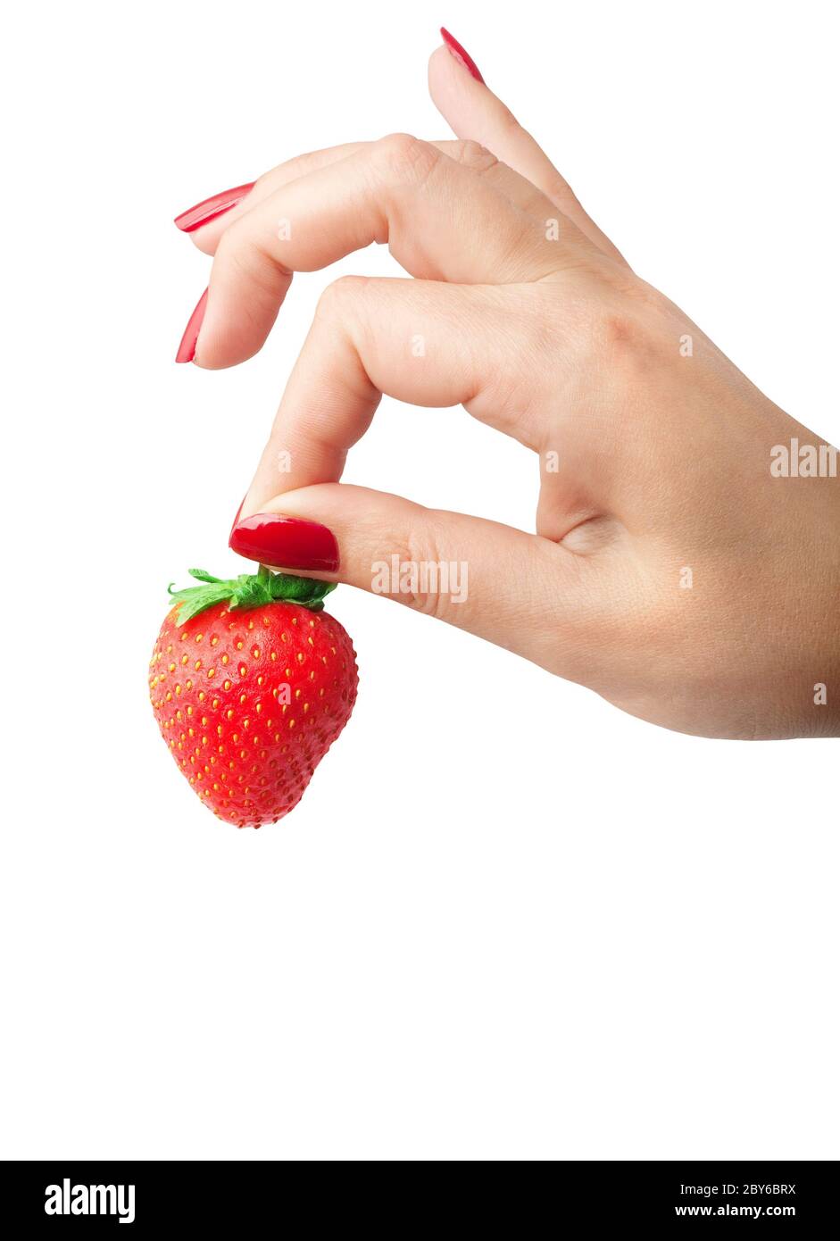 A strawberry in the hand isolated on white background Stock Photo - Alamy