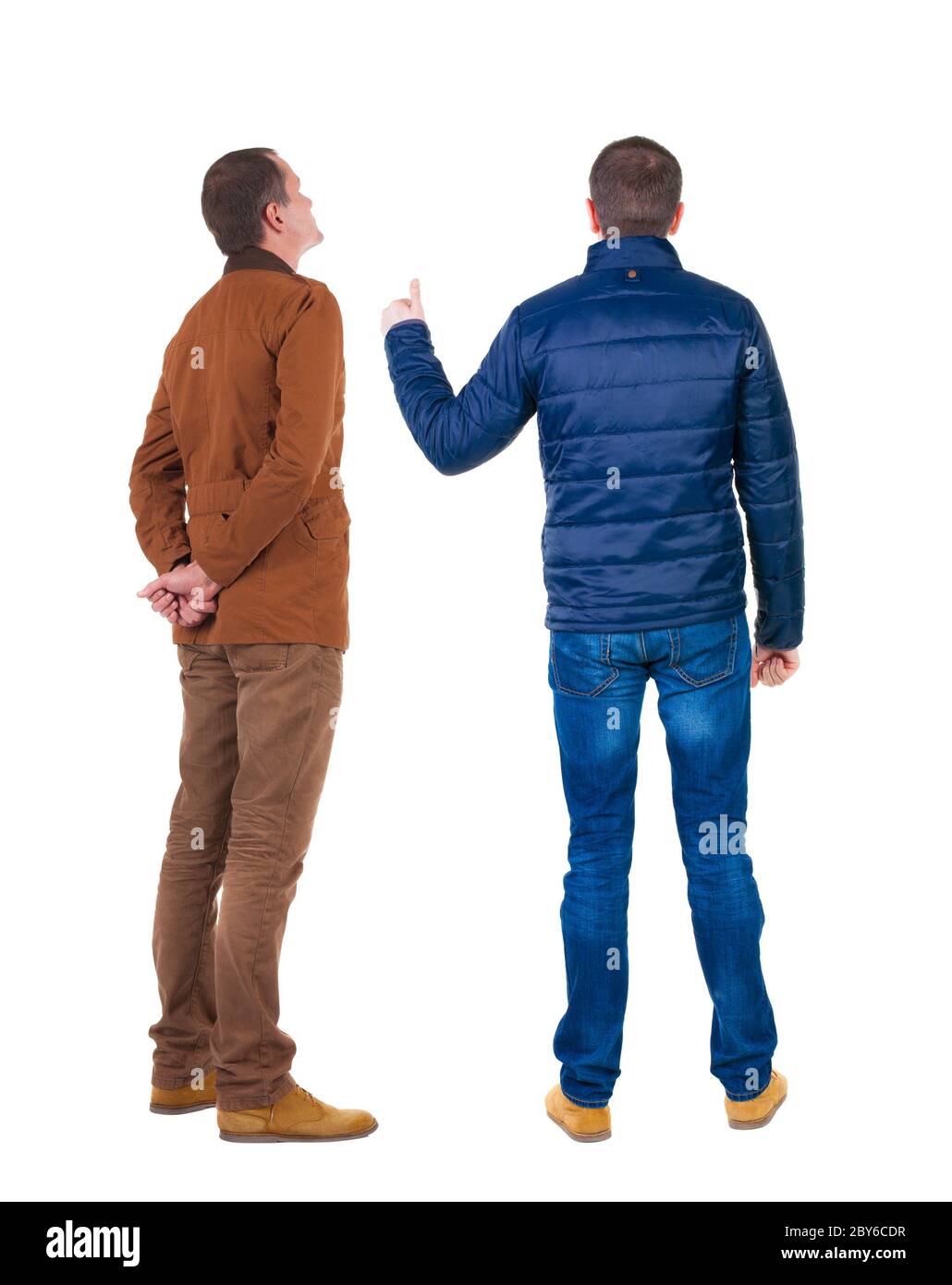 Back view of two man in winter jacket showing thumb up. Rear view ...