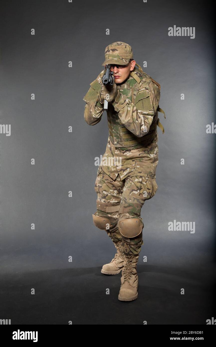 Soldier with rifle Stock Photo - Alamy