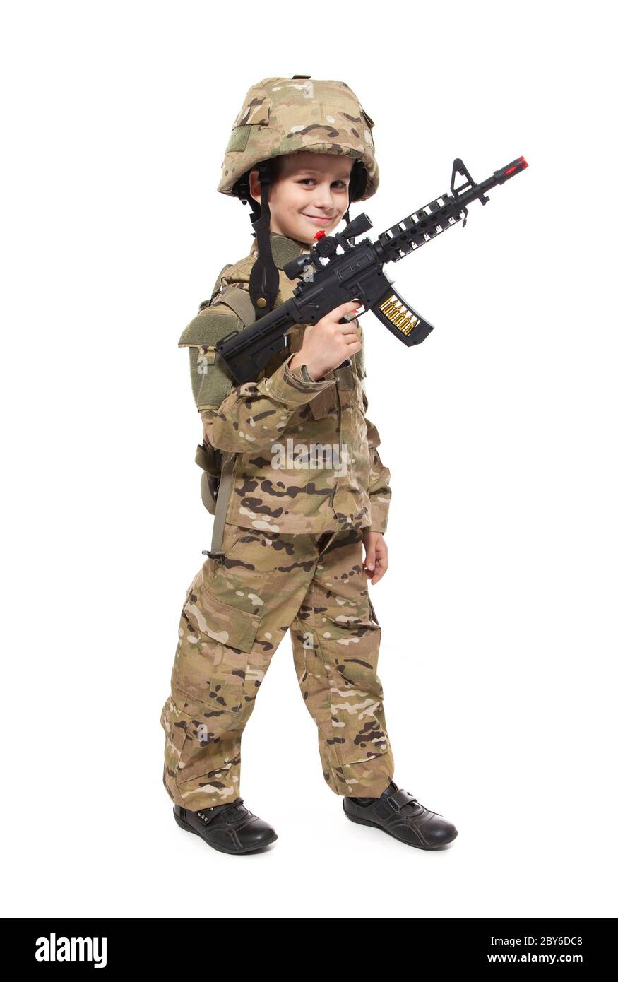 Young soldier with rifle Stock Photo - Alamy