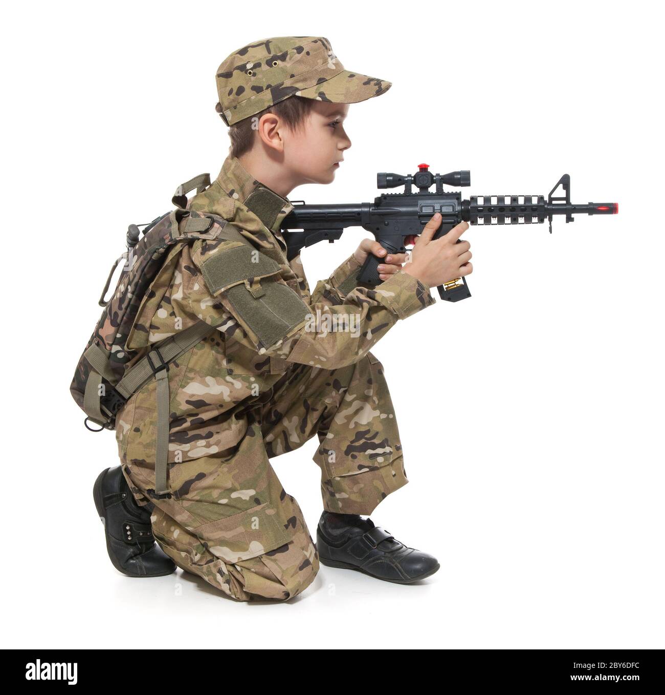 Young soldier with rifle Stock Photo - Alamy