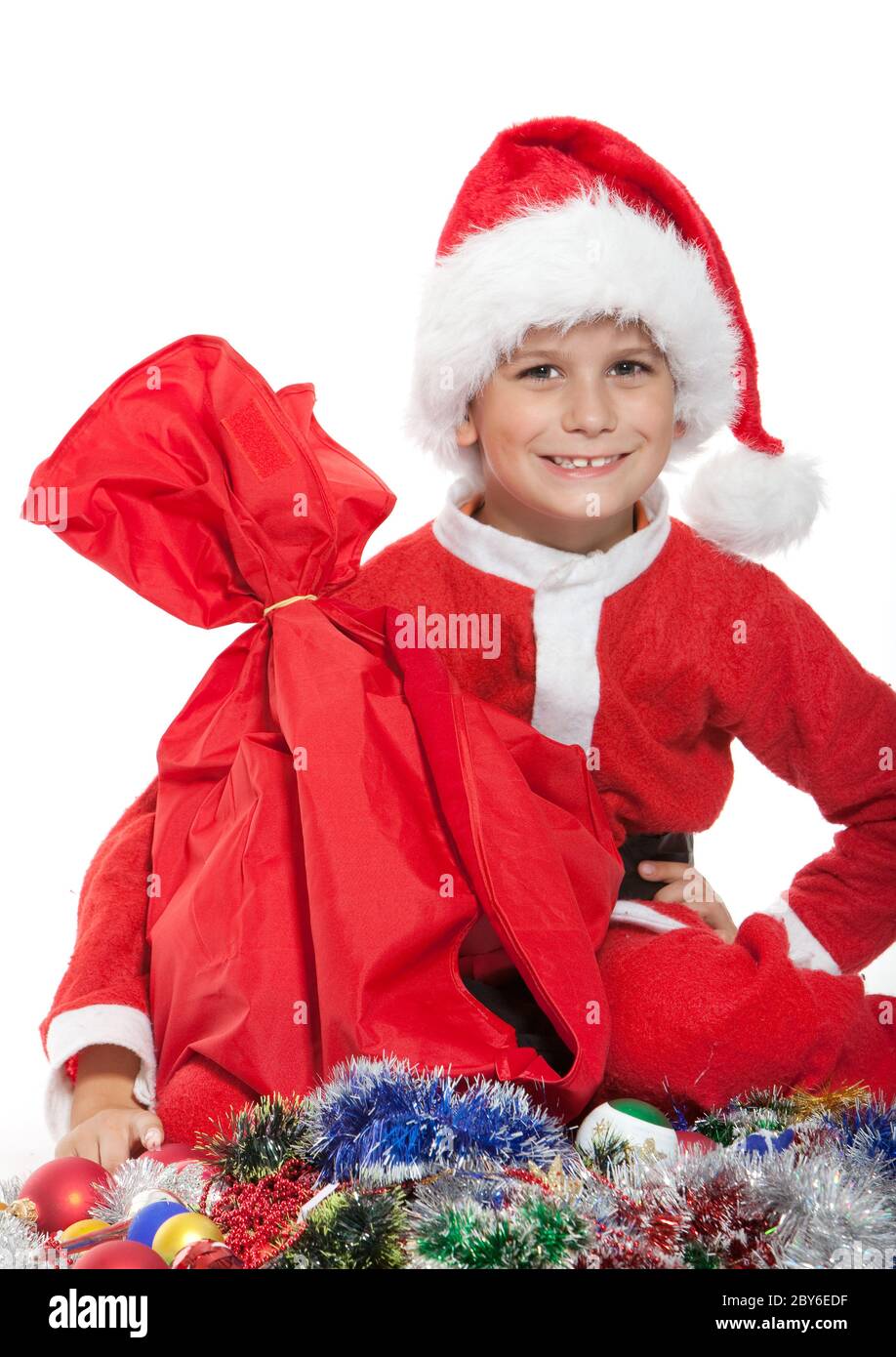 Boy holding a sack Stock Photo - Alamy