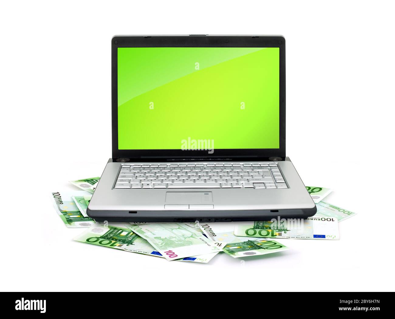 Open laptop with money Stock Photo - Alamy