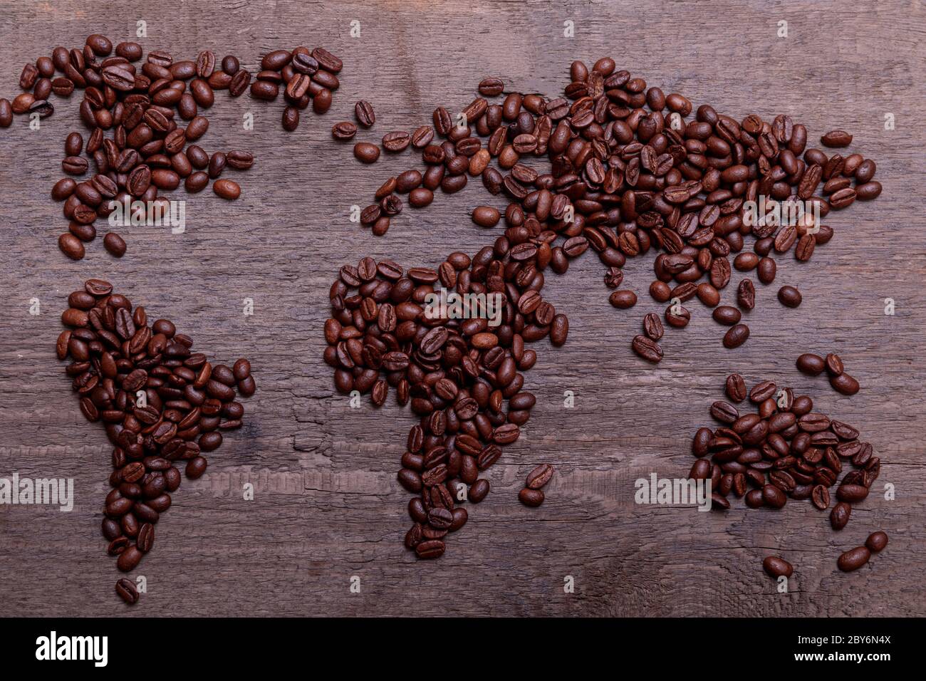 Dramatic photo of world map made of arabic roasted coffee beans on old ...