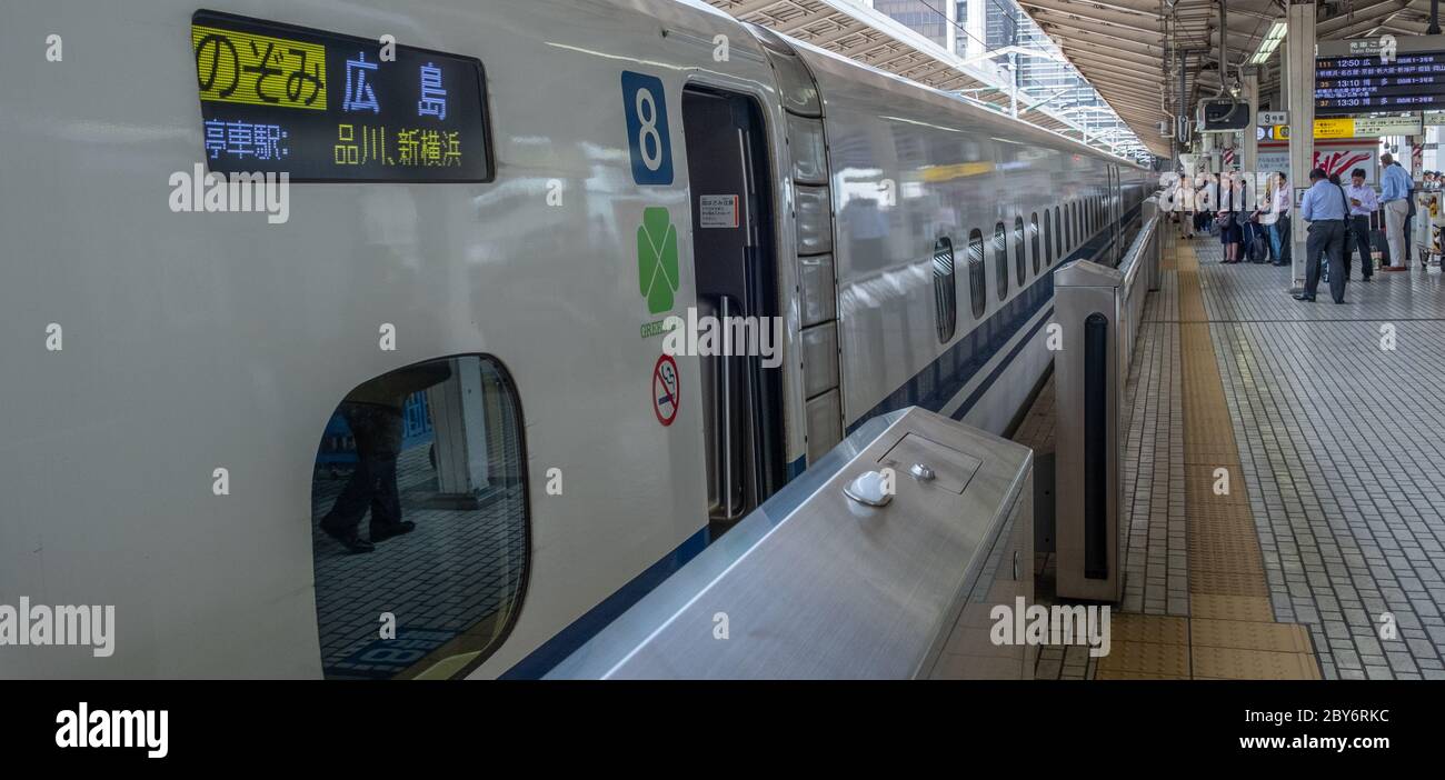 Passengers at Tokyo Railway Station platform, Tokyo, Japan Stock Photo ...