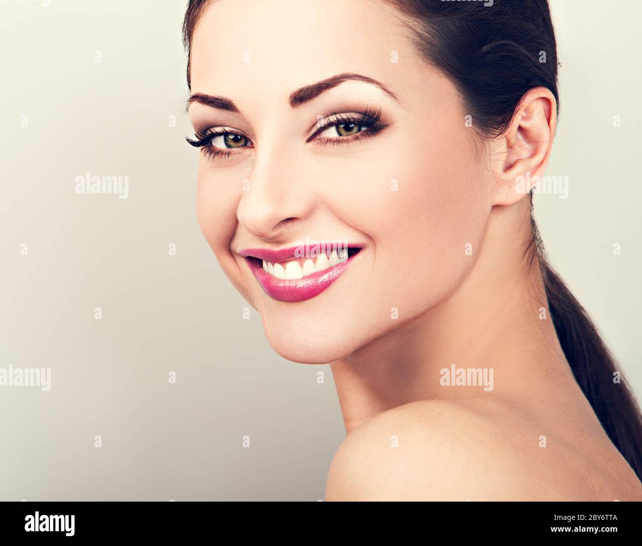 Beautiful woman with healthy clean face skin smiling with toothy smile ...