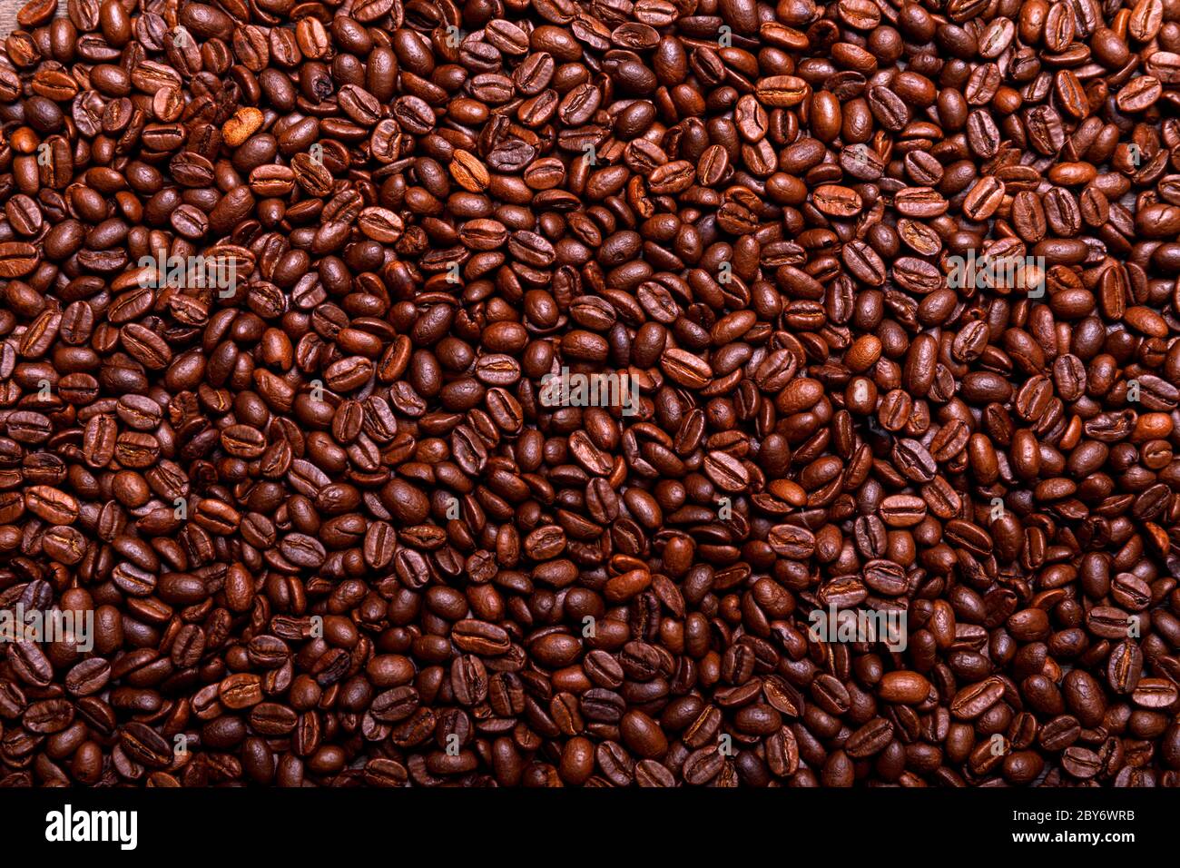 Close up of a roasted arabic coffee beans forming, organic square ...