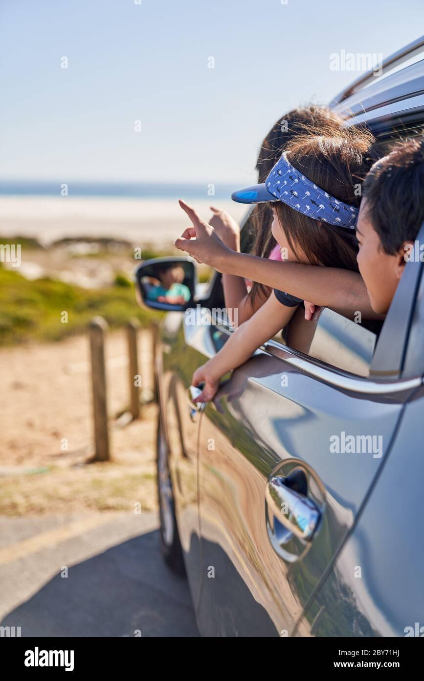 Child leaning out of car hi-res stock photography and images - Alamy