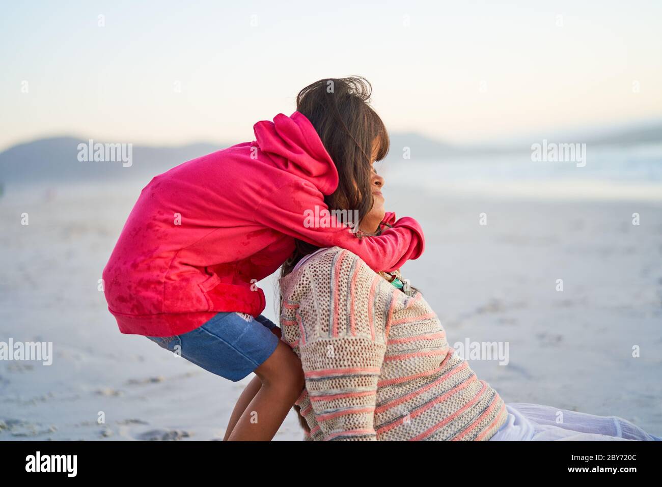 Mother hugging child three people hi-res stock photography and images - Alamy