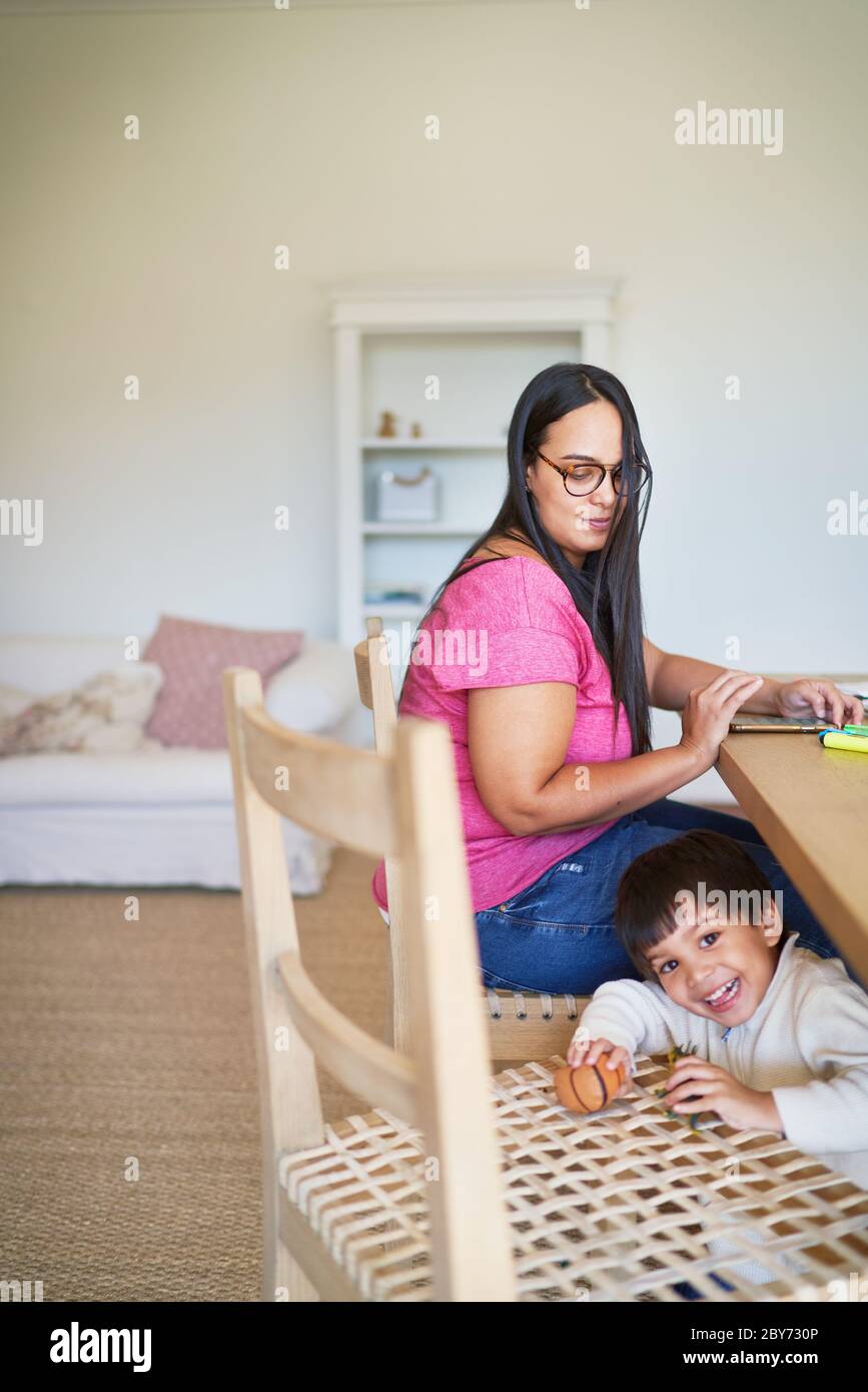 Adult under table hi-res stock photography and images - Alamy