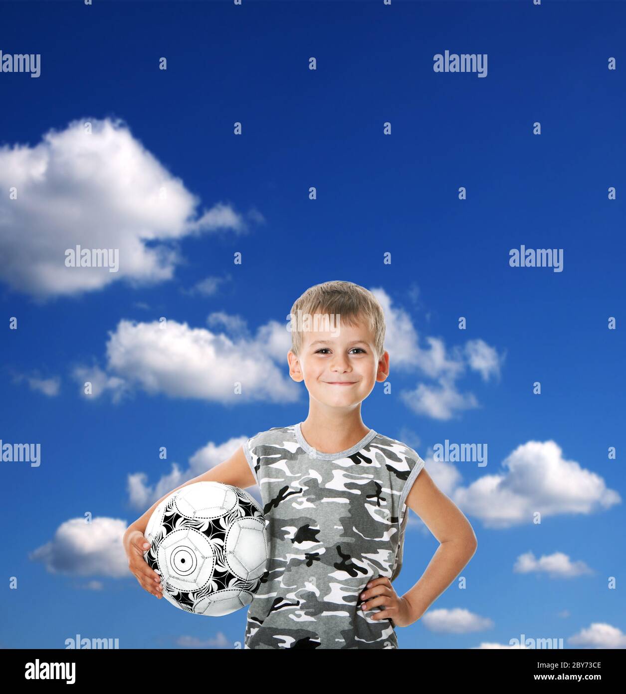 Boy holding soccer ball Stock Photo - Alamy Boy holding soccer ball Stock Photo - Alamy