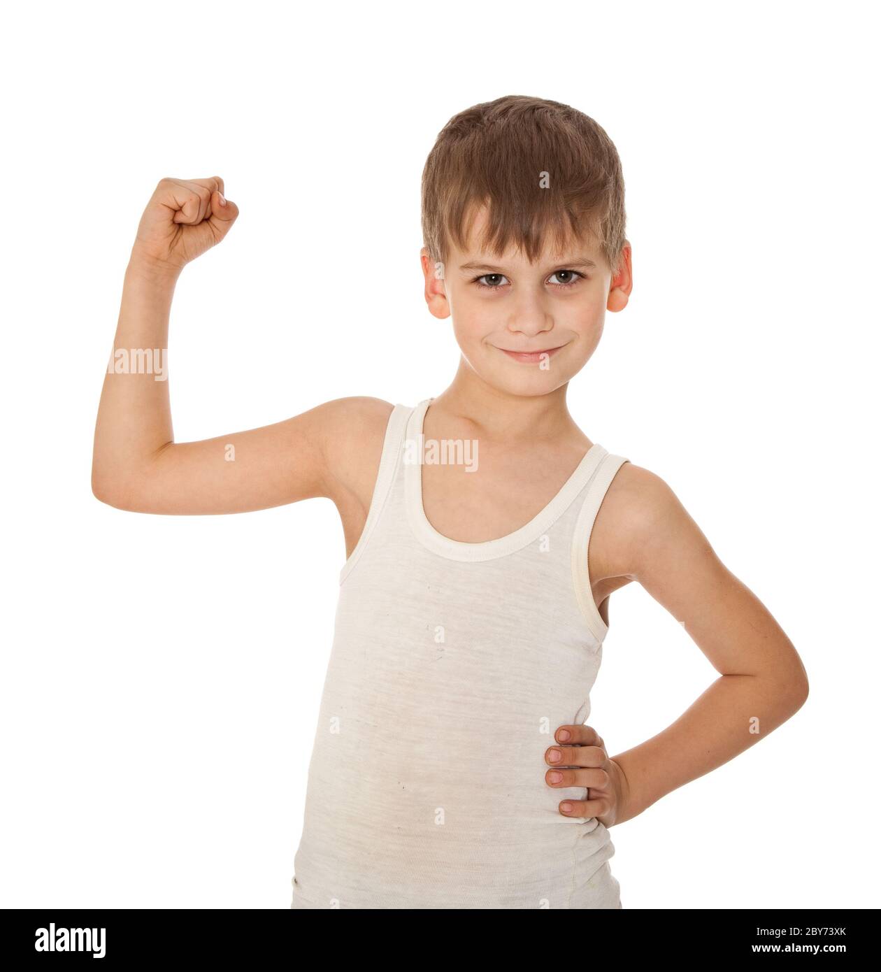 Boy showing his muscle Stock Photo - Alamy