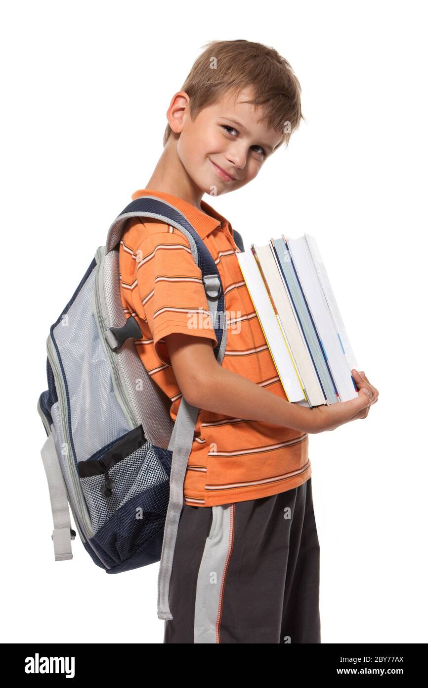 Boy holding books Stock Photo - Alamy