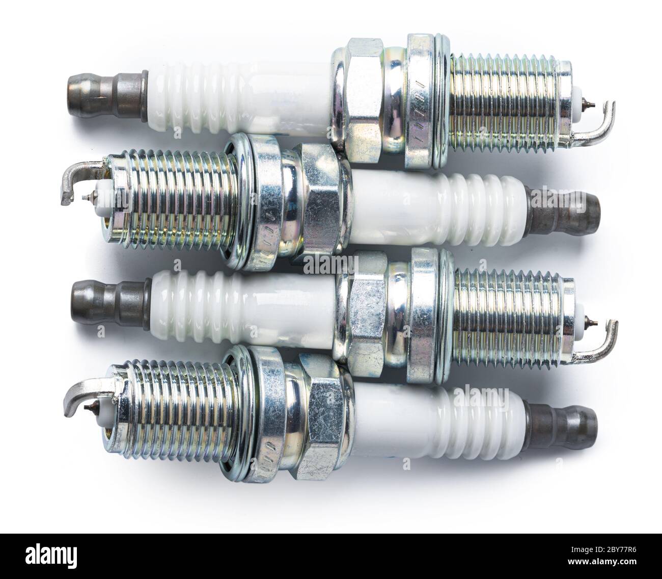 Car part. Spark plugs isolated on white Stock Photo - Alamy