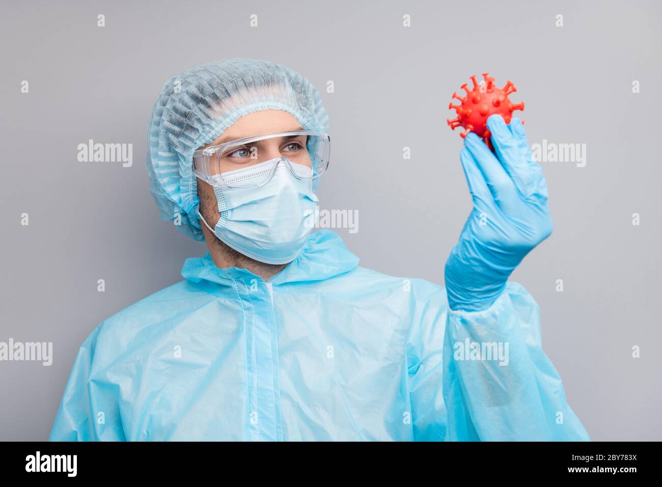 Closeup photo of guy doc virology center hold covid bacteria hands ...