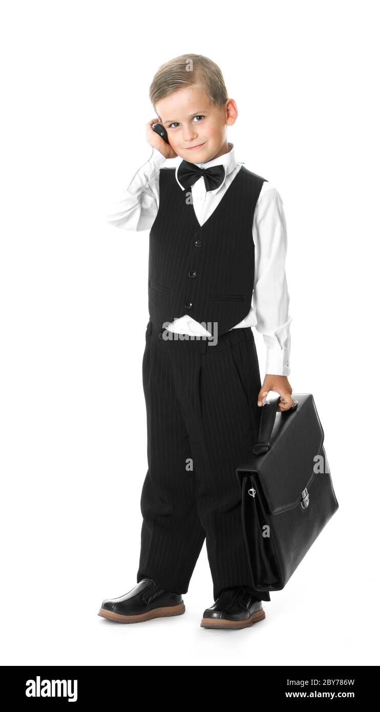 Boy holding a briefcase isolated on white background Stock Photo - Alamy