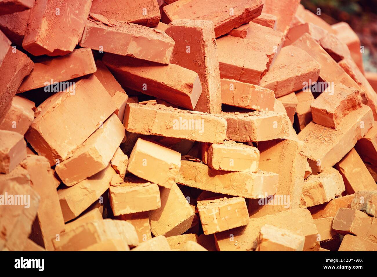 Clay handmade bricks. Abstract pile of bricks background Stock Photo ...